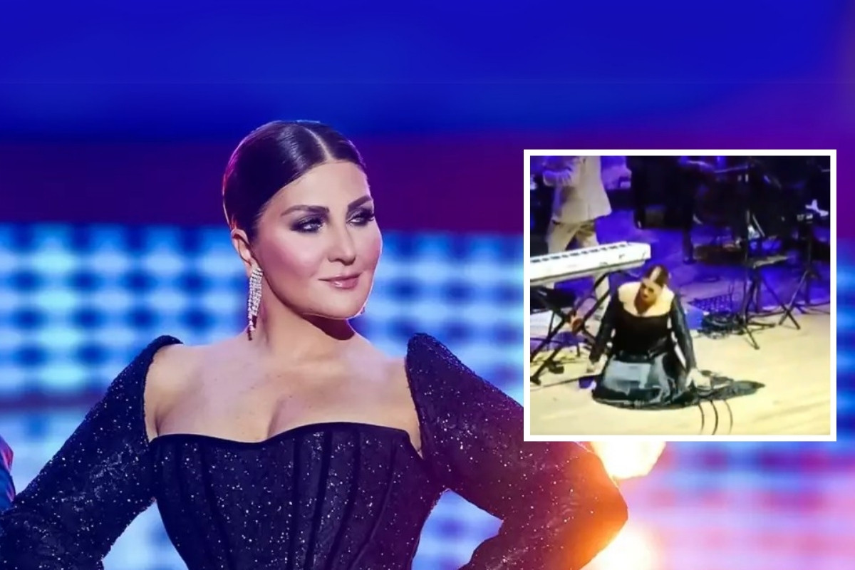 Sibel Can, sahne aldığı mekanda kıyafetinin azizliğine uğrayarak yere ...